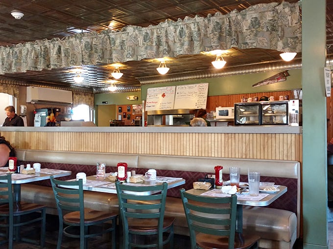 Inside, the classic diner aesthetic welcomes you with its counter seating and cozy booths – comfort food deserves a comfortable setting.