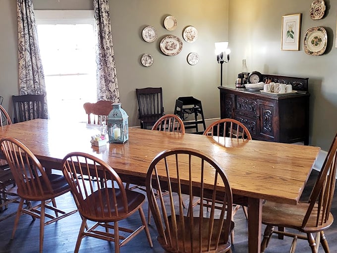 Inside, time slows down around these Windsor chairs and antique-adorned walls. Southern hospitality isn't just served here—it's the main ingredient.
