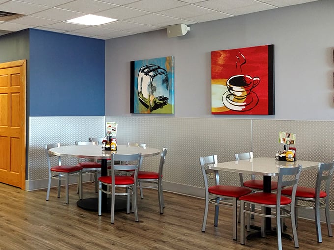 Modern meets classic with whimsical food art adorning the walls. That toaster painting? Pure breakfast poetry in acrylic.