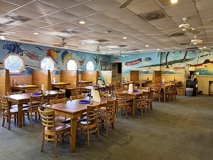 Nautical murals and porthole windows transform dining into a maritime adventure. It's like eating in an underwater clubhouse, minus the wetsuit requirement.