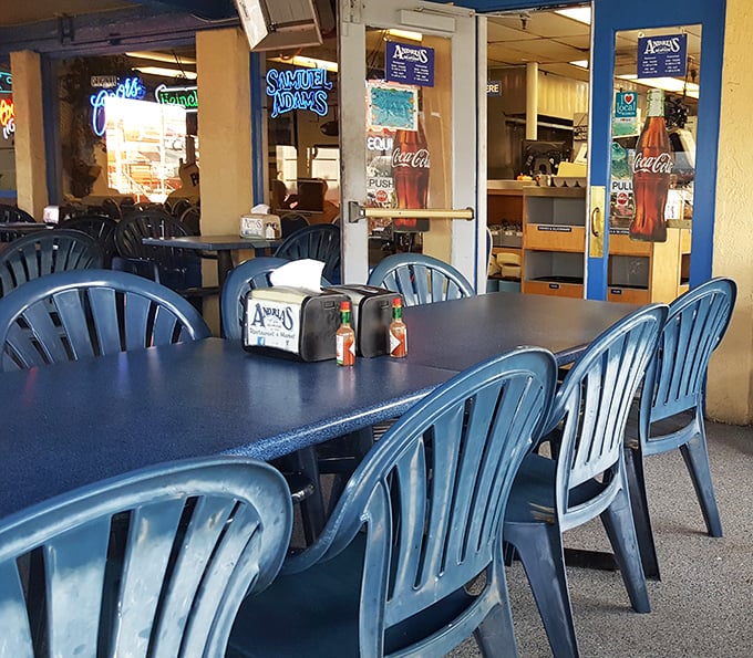 Simple blue chairs and no-nonsense tables set the stage for serious eating. This isn't about the décor—it's about the ocean-to-plate magic.