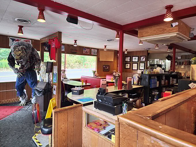 Step inside and time stands still – wood paneling, red vinyl booths, and a sasquatch greeter create the perfect backdrop for burger-based memories.