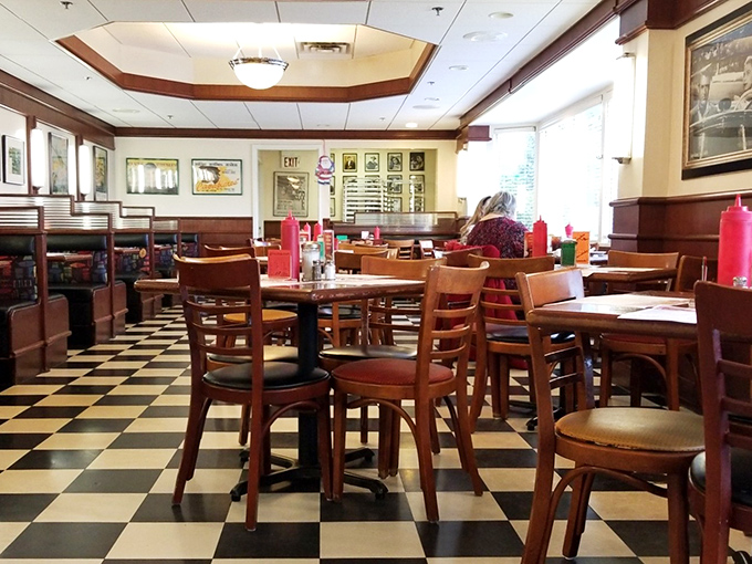 The classic black and white checkered floor isn't just nostalgic design—it's the universal signal that honest-to-goodness diner food awaits.