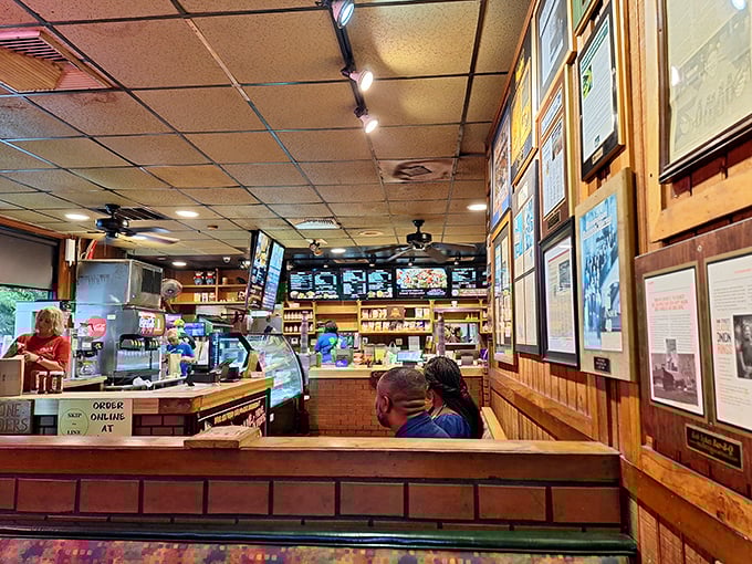 Step inside and you're greeted by wood-paneled walls adorned with decades of history—a barbecue time capsule where memories are made and appetites are satisfied.