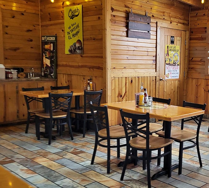 Warm wood paneling creates an atmosphere that's part neighborhood tavern, part your favorite uncle's cabin—minus the questionable hunting trophies.
