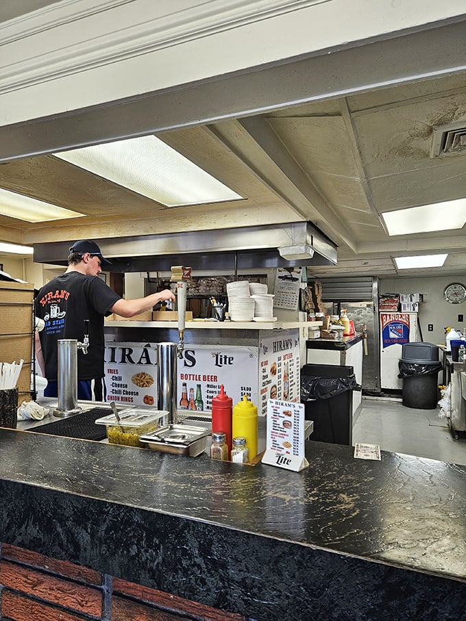 Step inside where fluorescent lights illuminate decades of perfected recipes and genuine hospitality.