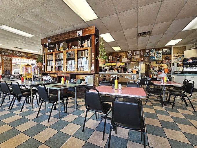 Checkerboard floors and memorabilia-covered walls – this isn't decoration, it's a living museum of American road trip culture.