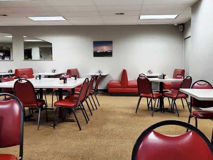 Red vinyl chairs and white tables – not Instagram-worthy décor, but the perfect backdrop for food that doesn't need filters to impress.