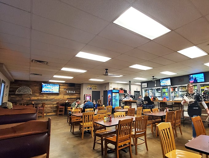 Wooden chairs, rustic paneling, and TVs tuned to the game – this isn't fancy dining, it's something better: a genuine community gathering spot.
