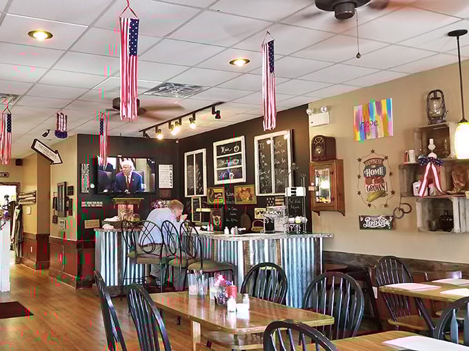 American flags hang proudly while Windsor chairs await – this isn't just a restaurant, it's a Norman Rockwell painting where you can actually eat.
