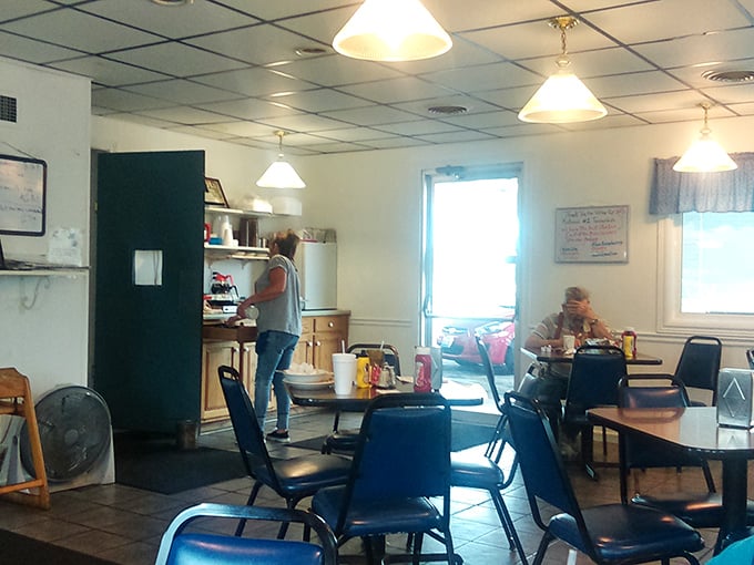 Inside Ray's, time slows down. Blue chairs, pendant lights, and the quiet hum of conversation create the perfect backdrop for Indiana's ultimate comfort food experience.