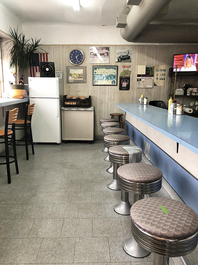 Simplicity reigns supreme inside this Detroit institution. Chrome stools, blue Formica countertop, and wood-paneled walls create the perfect stage for ham's starring role.