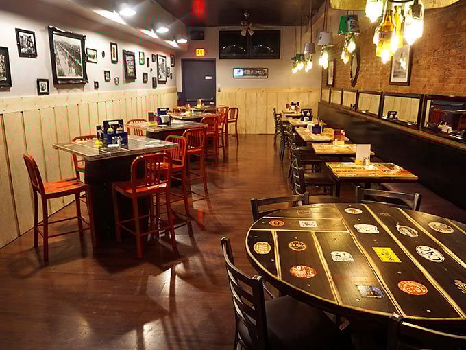 Where beer logo tables meet red metal chairs and wood paneling. It's not trendy—it's timeless, like comfort food for your eyes.