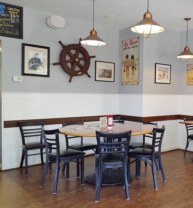 Nautical nostalgia meets comfort at every table. That ship's wheel isn't just decoration—it's steering you toward flavor country.