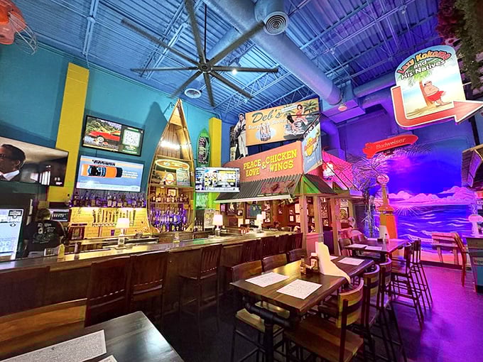 Step inside and the sensory overload begins – blue ceilings, neon lights, and enough memorabilia to fill a small museum. Dining room or fever dream? Both!