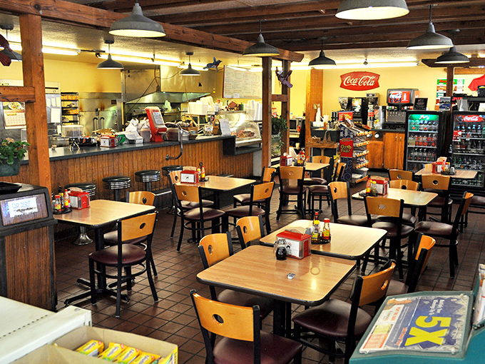 Simple wooden tables, yellow walls, and the promise of smoky delights. This dining room may lack pretension, but it overdelivers on flavor.