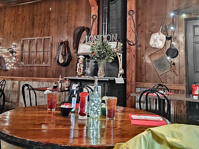 Warm wood paneling and vintage farm implements create the perfect carnivore's sanctuary—where conversations flow as smoothly as the after-dinner coffee.