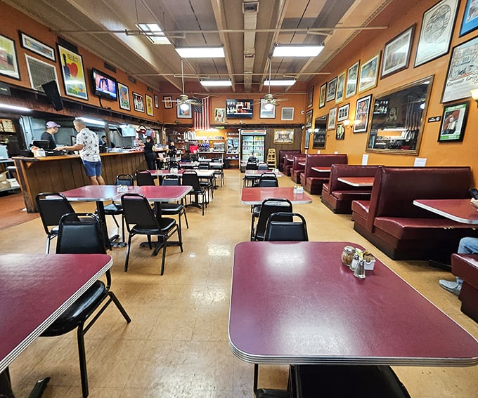 Inside, burgundy booths and orange walls create the perfect backdrop for morning conversations and coffee refills that never seem to end.
