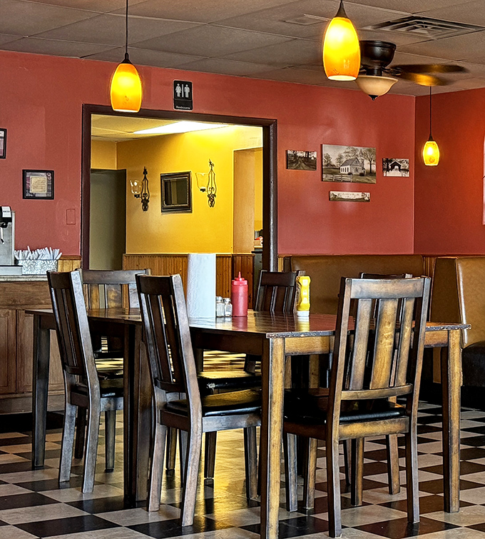 Warm pendant lighting and wooden tables create that "I've found my new favorite spot" feeling. The checkered floor adds just the right touch of diner nostalgia.