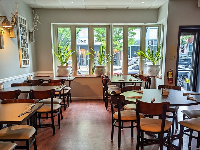 Sunlight streams through large windows, illuminating a dining room where conversations flow as freely as the coffee refills.