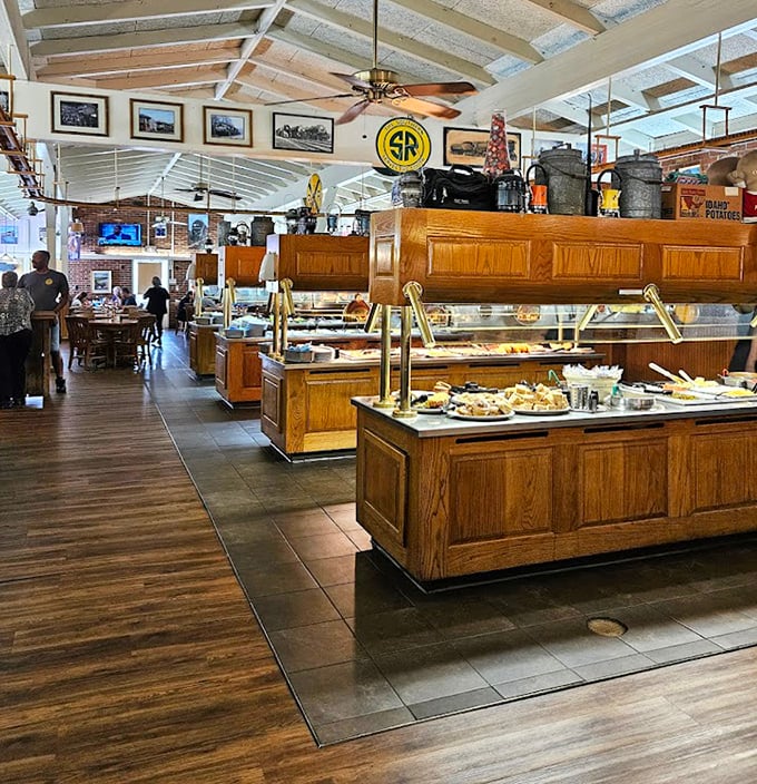 Railroad memorabilia meets comfort food heaven. The buffet area's wooden craftsmanship recalls an era when dining was an experience, not just a pit stop.
