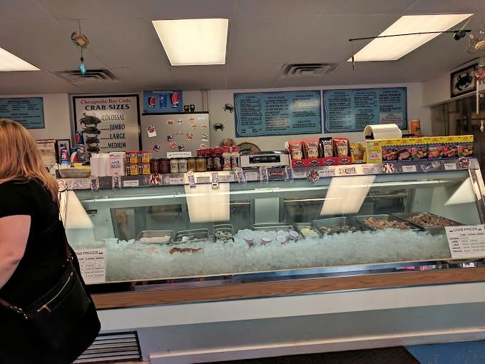 Behind this counter lies treasure more valuable than gold: fresh Chesapeake blue crab meat waiting to become someone's delicious memory.