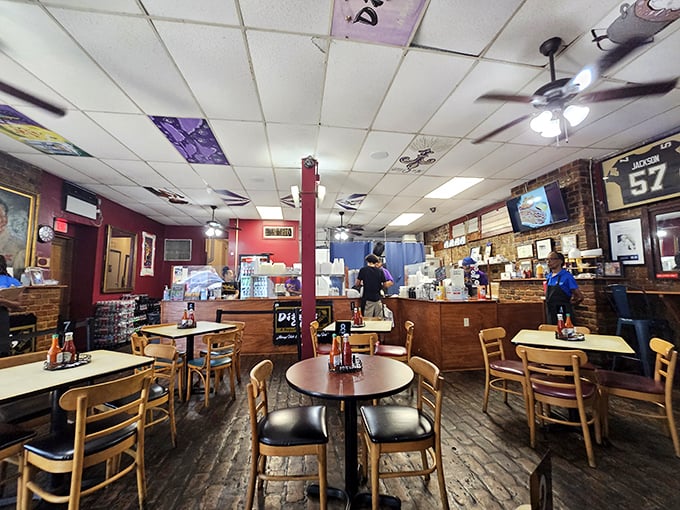 Inside, wooden tables and brick walls create the perfect backdrop for culinary magic. No white tablecloths needed when the food does all the talking.