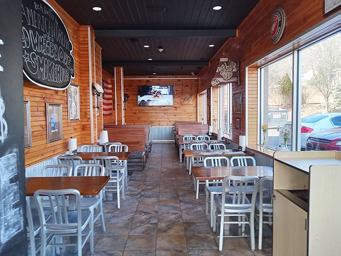 Wooden walls and simple seating tell you they're focused on what matters. This isn't fancy dining – it's serious barbecue business in a cozy, unpretentious space.