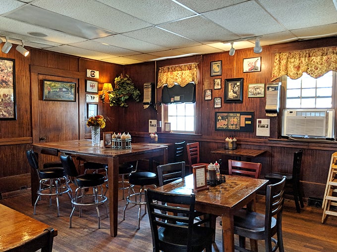 Wood-paneled walls tell stories of barbecue pilgrimages past. This isn't décor—it's a shrine to smoked meat devotion.