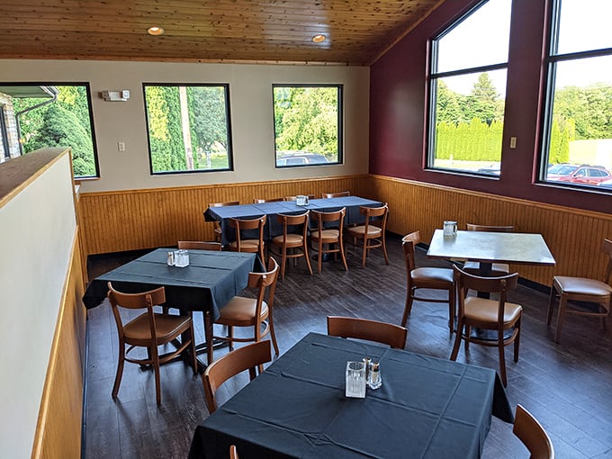 Simple, comfortable, and ready for serious eating. This dining room isn't trying to impress your Instagram—it's focused on impressing your taste buds.
