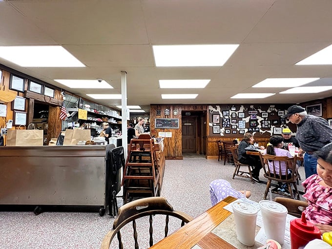 Inside, wood-paneled walls covered with memorabilia tell stories of decades of satisfied customers. This isn't interior design—it's BBQ history in the making.