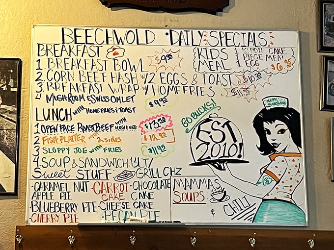 The hand-drawn specials board – where culinary dreams are sketched in marker. That retro waitress illustration isn't just decoration; she's silently judging your breakfast indecision.