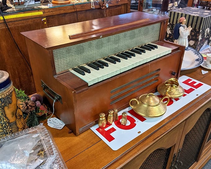 This vintage mini piano isn't just an instrument—it's a time machine waiting for someone's fingers to bring back melodies from another era.