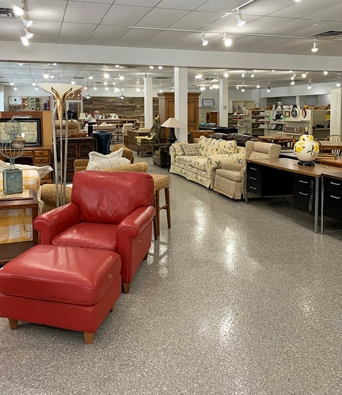 The furniture section offers more character than a Wes Anderson film—that red leather chair is practically begging for a good book.