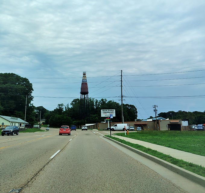 Driving down Route 159, you'll spot this towering condiment long before you reach it—like a ketchup lighthouse guiding hungry travelers home.