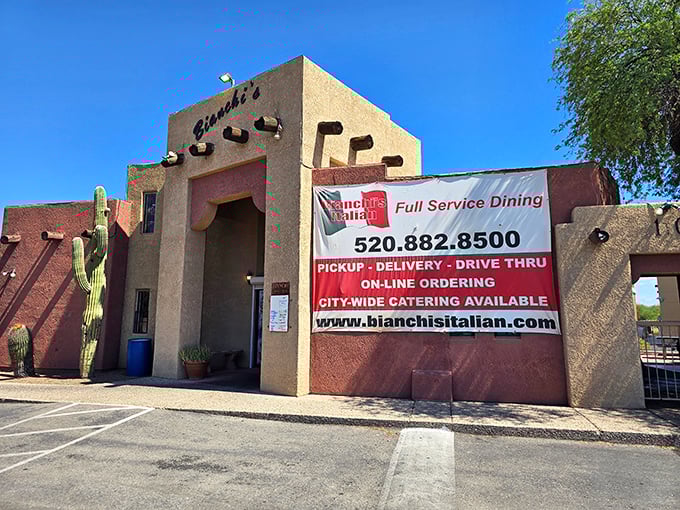 Adobe walls and desert landscaping whisper promises of authentic Italian flavors within.