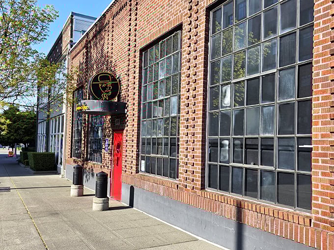 El Gaucho's brick warehouse exterior whispers sophistication while that red door practically shouts "adventure awaits inside!"