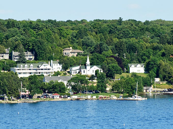 Ephraim's white church steeple rises above the trees, a postcard-perfect scene against Wisconsin's blue waters.