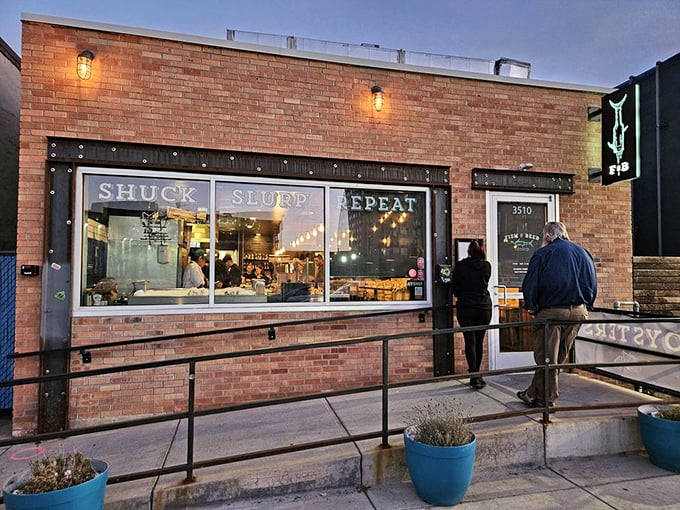 That "Shuck, Slurp, Repeat" window sign is basically Denver's seafood mantra – truth in advertising at its finest.