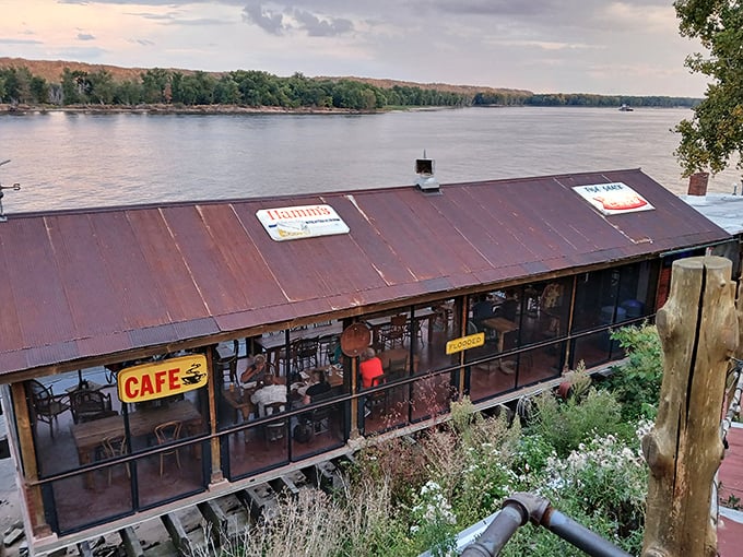 Perched right on the Mississippi, this rustic shack serves up river views that rival the fish on your plate.