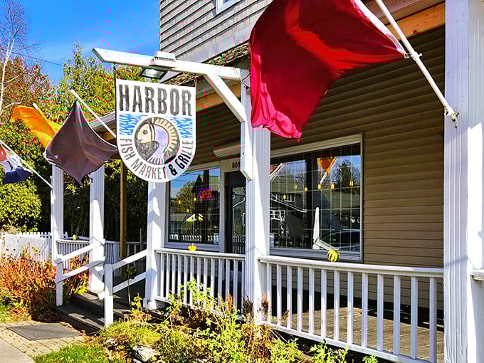 Harbor Fish Market's porch flies more flags than the United Nations—a colorful welcome that whispers "fresh catch inside!"