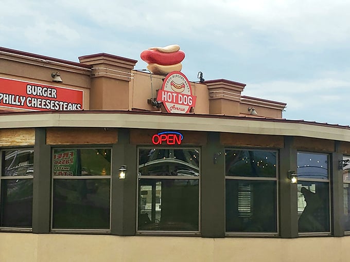 Hot Dog Avenue's giant wiener sign isn't compensating for anything—the dogs inside truly measure up to the hype!