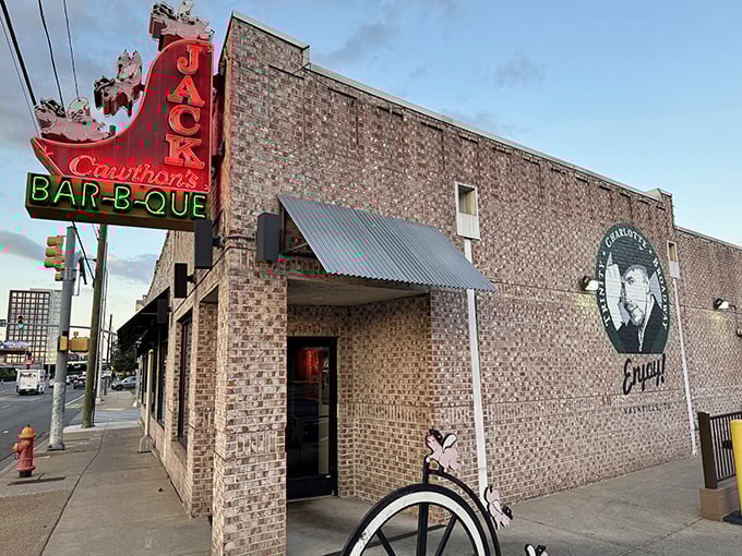 Jack Cawthon's iconic neon sign beckons hungry travelers like a barbecue lighthouse in the Nashville night.