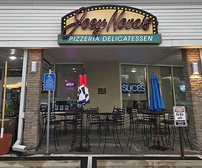 That neon sign isn't just decoration – it's a beacon of hope for anyone craving authentic East Coast pizza in the Land of 10,000 Lakes.
