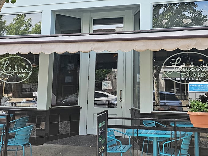 Those bright blue chairs and scalloped awnings create the perfect spot for leisurely breakfast people-watching sessions.