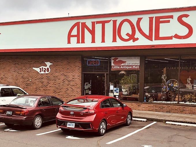Bold red letters announce a wonderland of nostalgia at Little Antique Mall – no GPS needed to find this landmark!