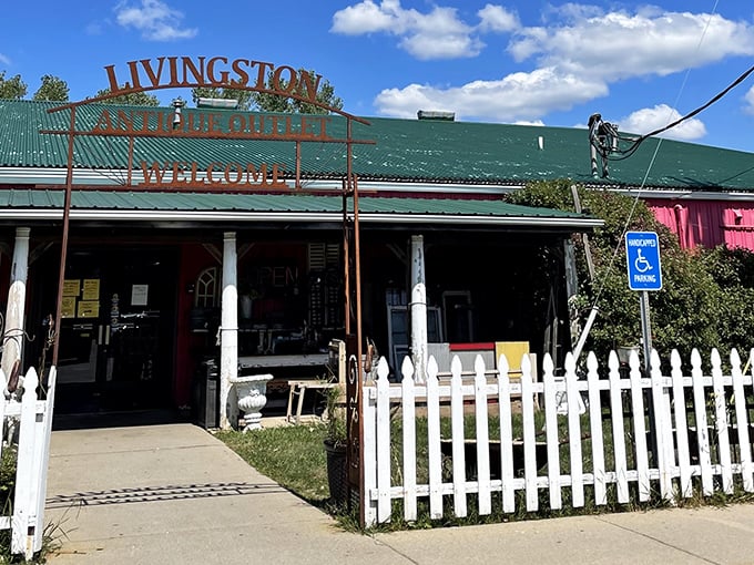 Livingston Antique Outlet: "That white picket fence isn't just for show—it's holding back an avalanche of vintage treasures waiting to be discovered."