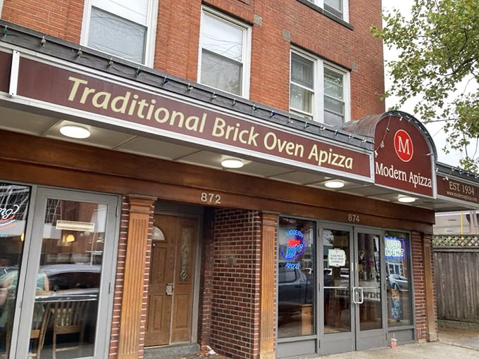 Modern Apizza's brick facade whispers promises of coal-fired perfection – and boy, does it deliver on them.