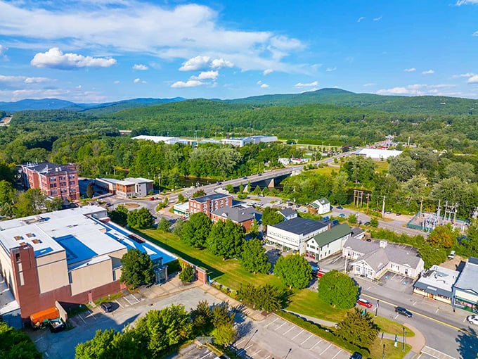 College town tranquility spreads across rolling hills where students and locals share peaceful coexistence.