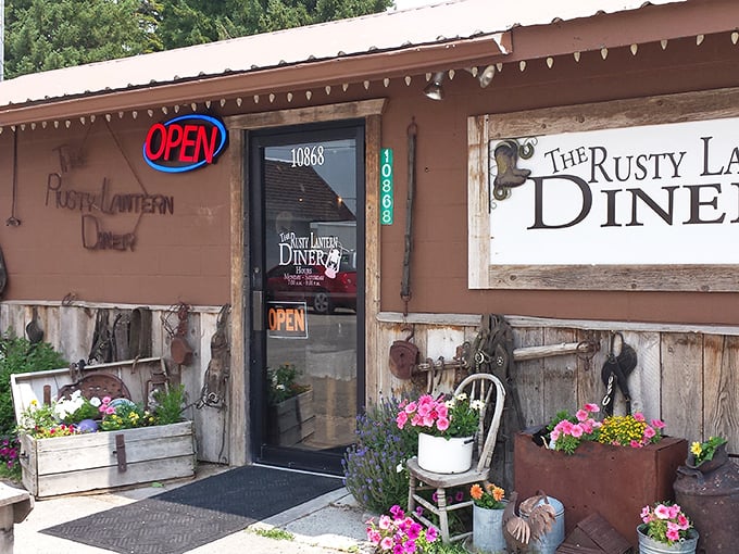 Rustic wooden charm meets colorful blooms - small-town dining at its most welcoming and authentic.